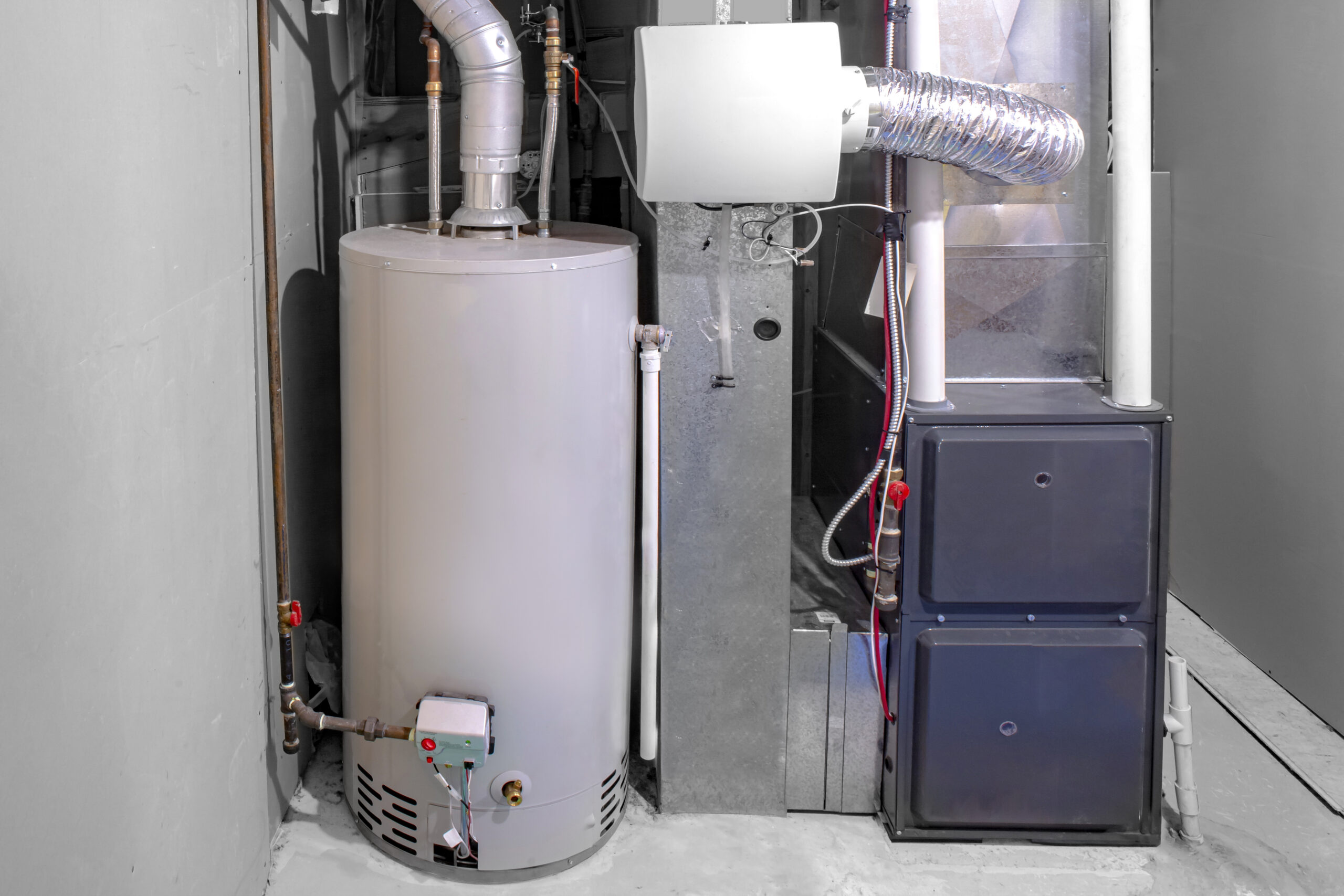 A home high efficiency furnace with a residential gas water heater ...